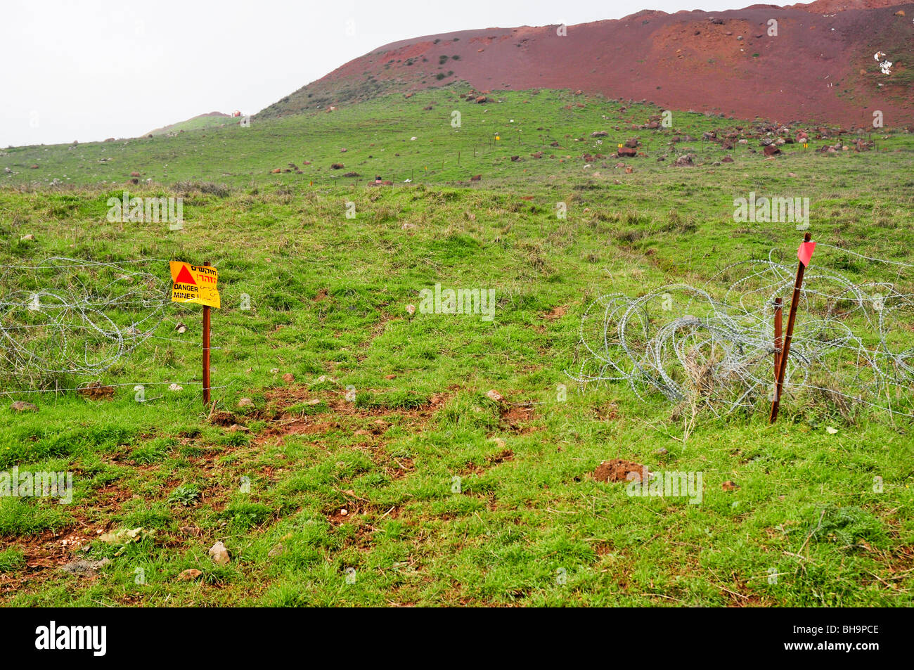 Israel, Golan Heights, an old pre Six Day War minefield - Gap in fence ...