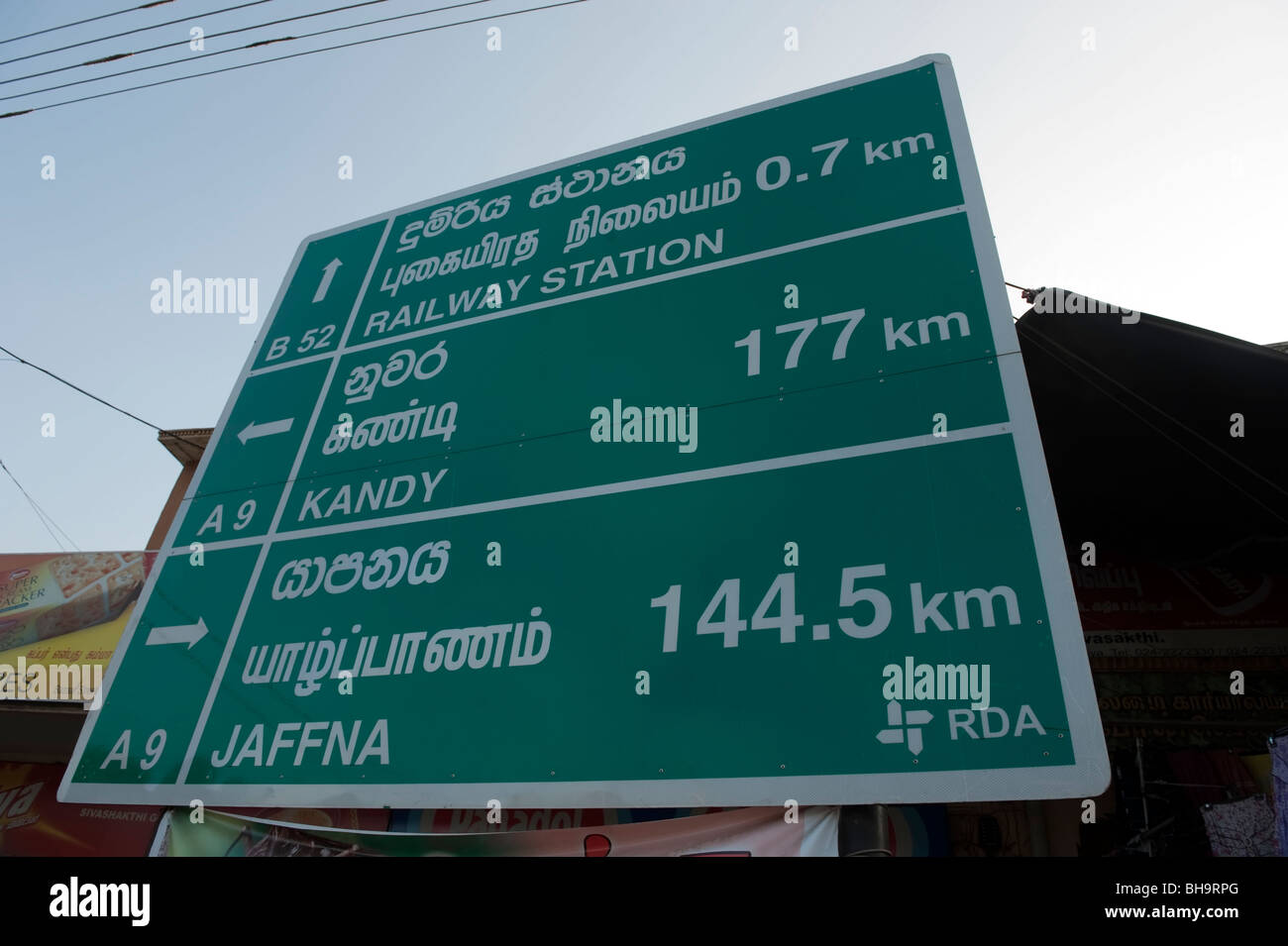 Vavuniya road sign, Kandy, Jaffna in Bazaar Street Stock Photo - Alamy