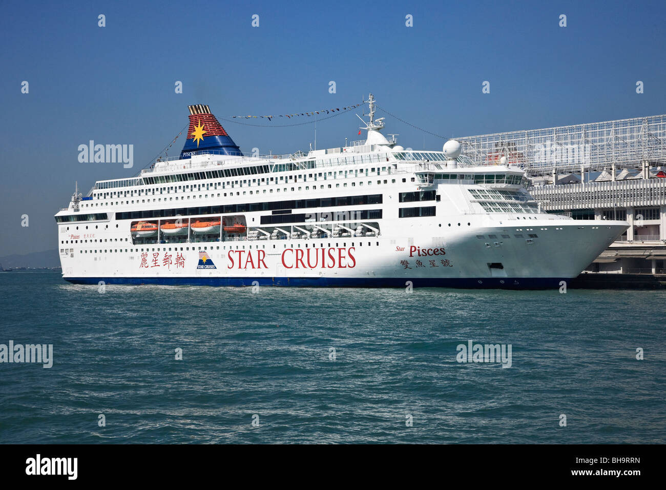 A deep sea cruise liner berthed in Hong Kong Stock Photo - Alamy