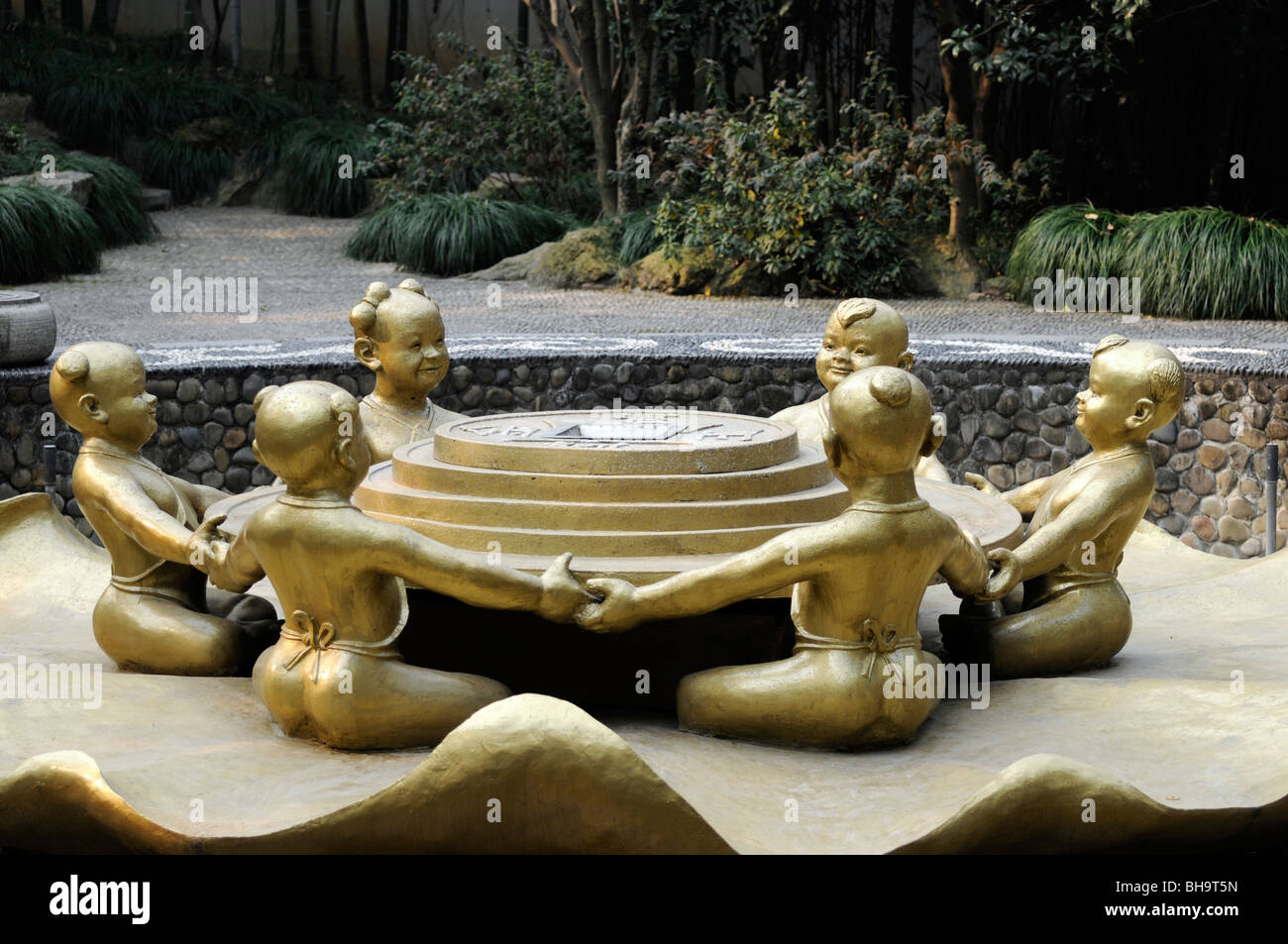 The Pond of Luck in the Good Luck Garden, Yellow Dragon Cave park ...