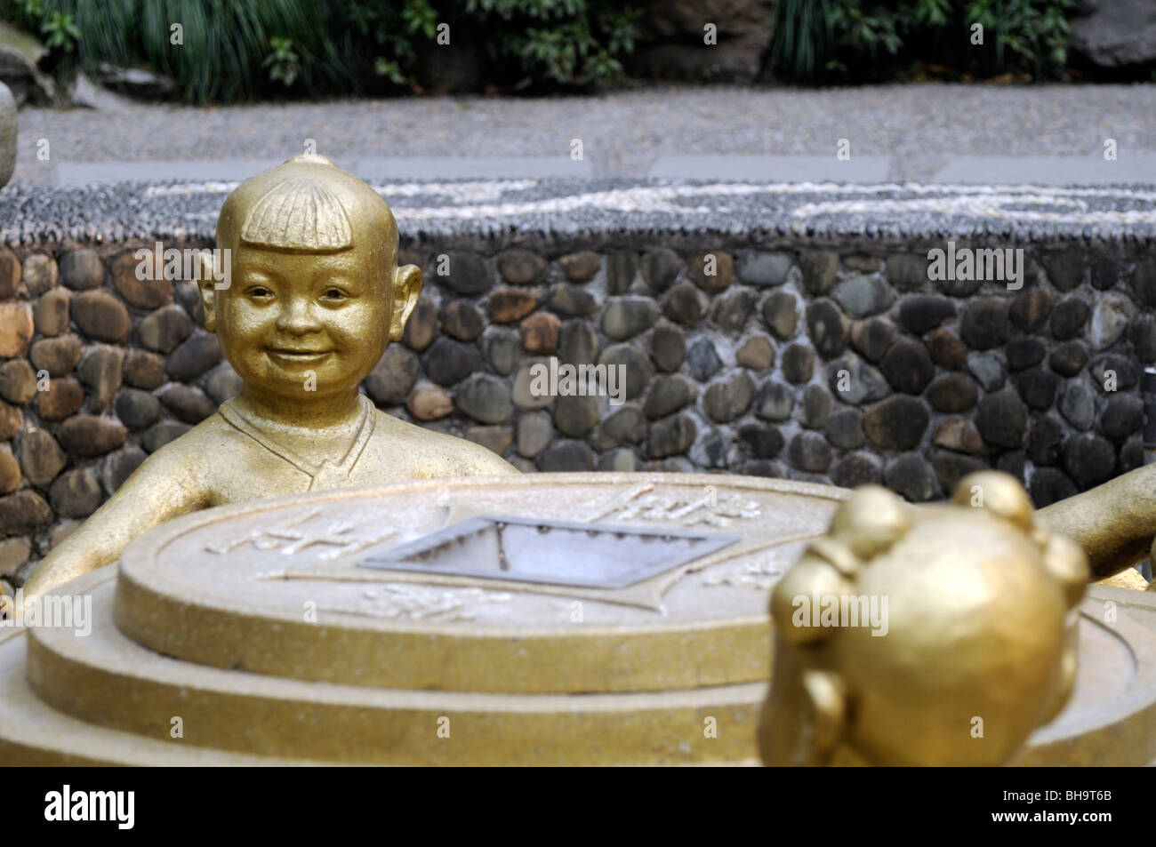 The Pond of Luck in the Good Luck Garden, Yellow Dragon Cave park ...