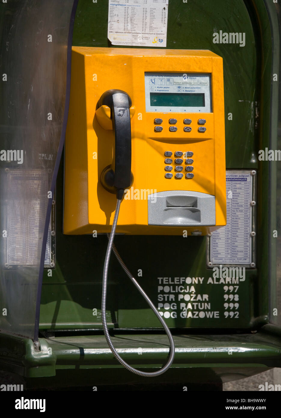 Pay, telephone booth, Krakow, Poland Stock Photo - Alamy