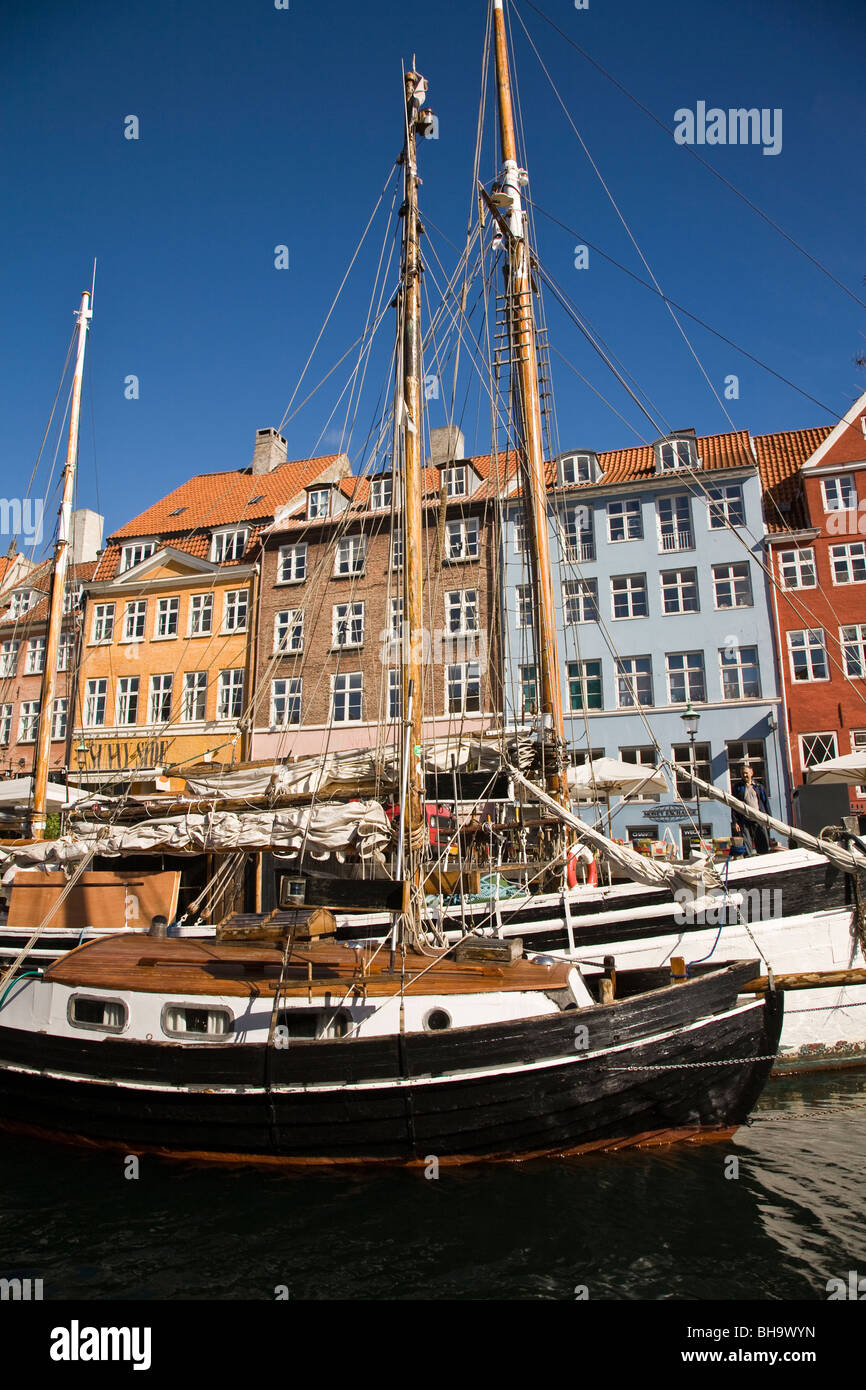 Nyhavn Canal is a trendy waterway lined with sidewalk cafes and a ...