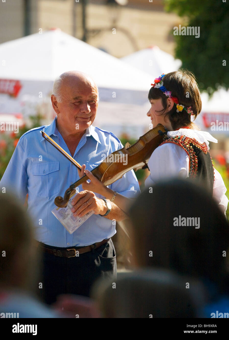 Poland, Krakow, People at Main Market Square Stock Photo - Alamy