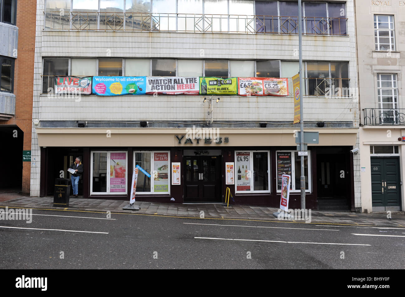 Yates's bar in West Street Brighton with advertising banners on the ...