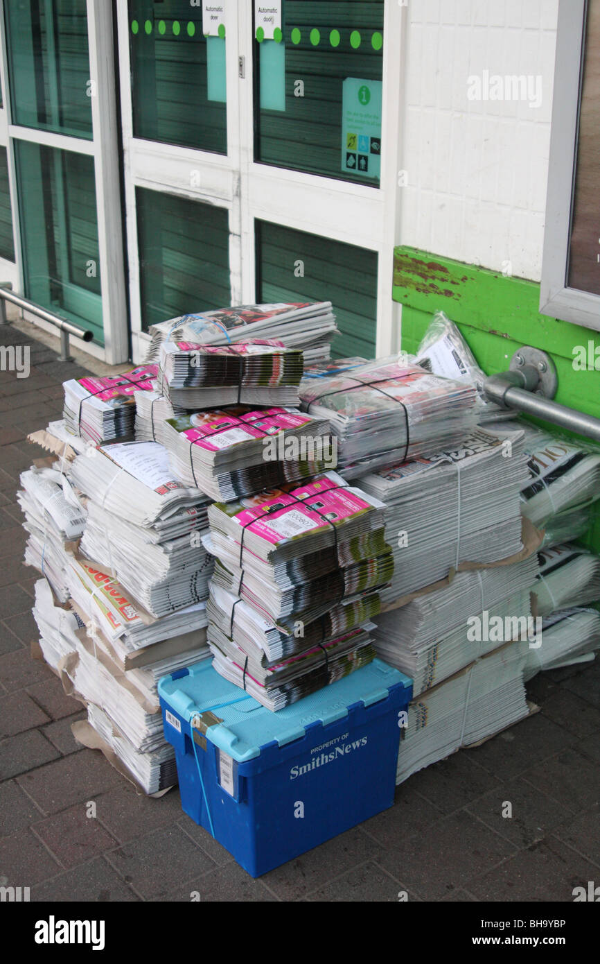 Newspapers outside a store in a U.K. city Stock Photo - Alamy