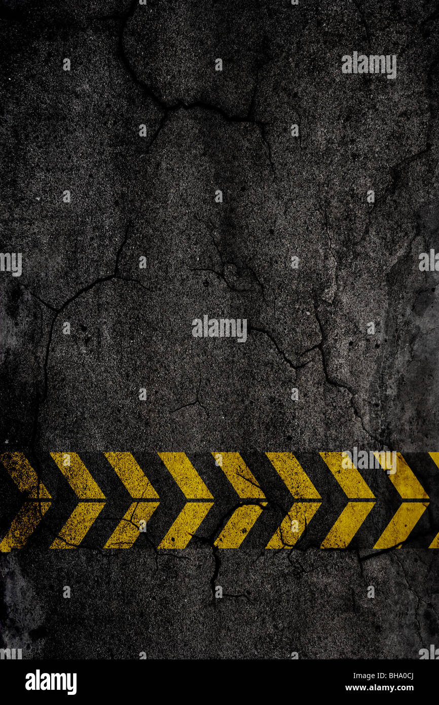 Asphalt background texture with construction signs Stock Photo - Alamy