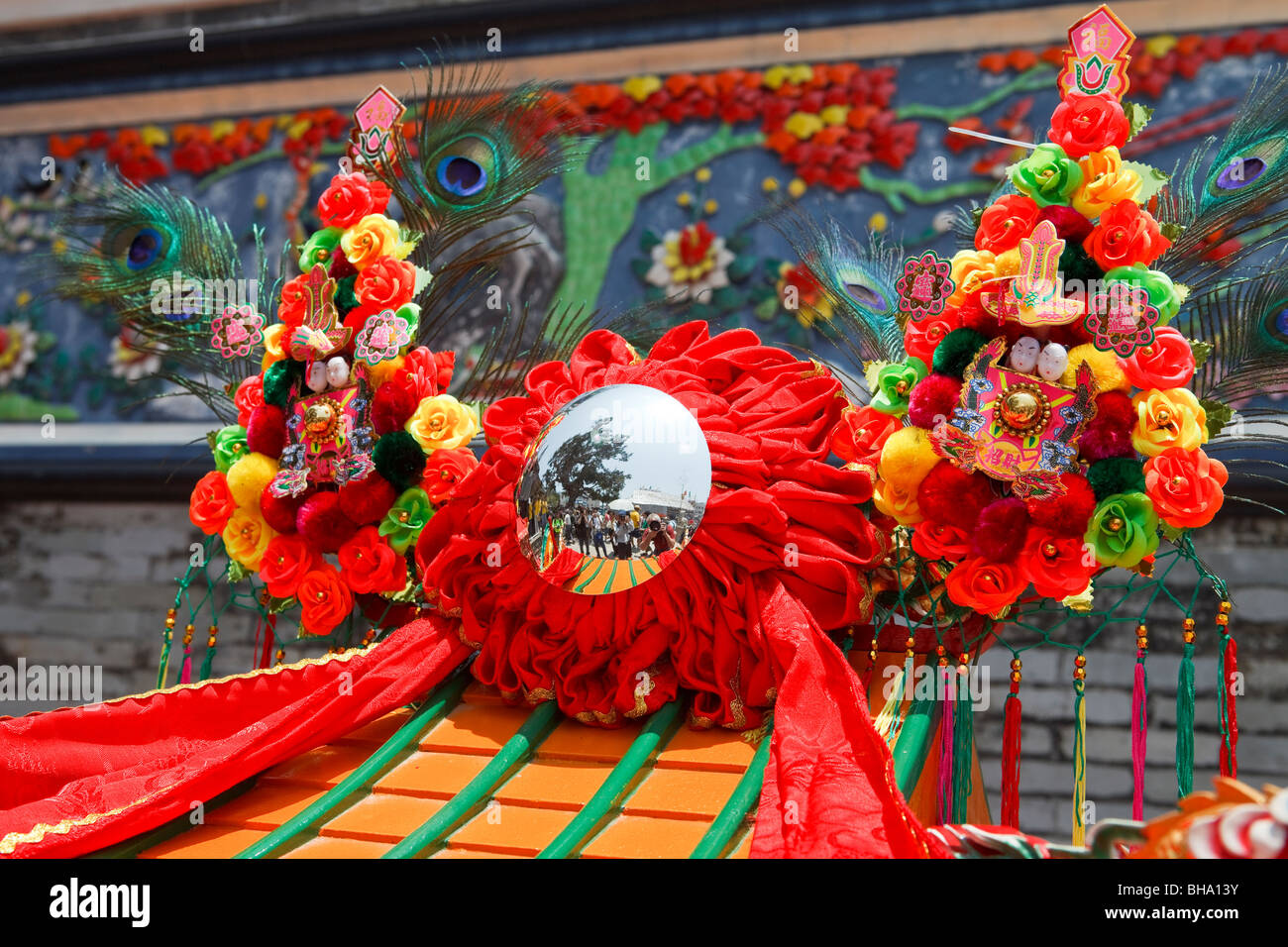 A close up detail of a roof decoration of a Chinese litter at Cheung ...
