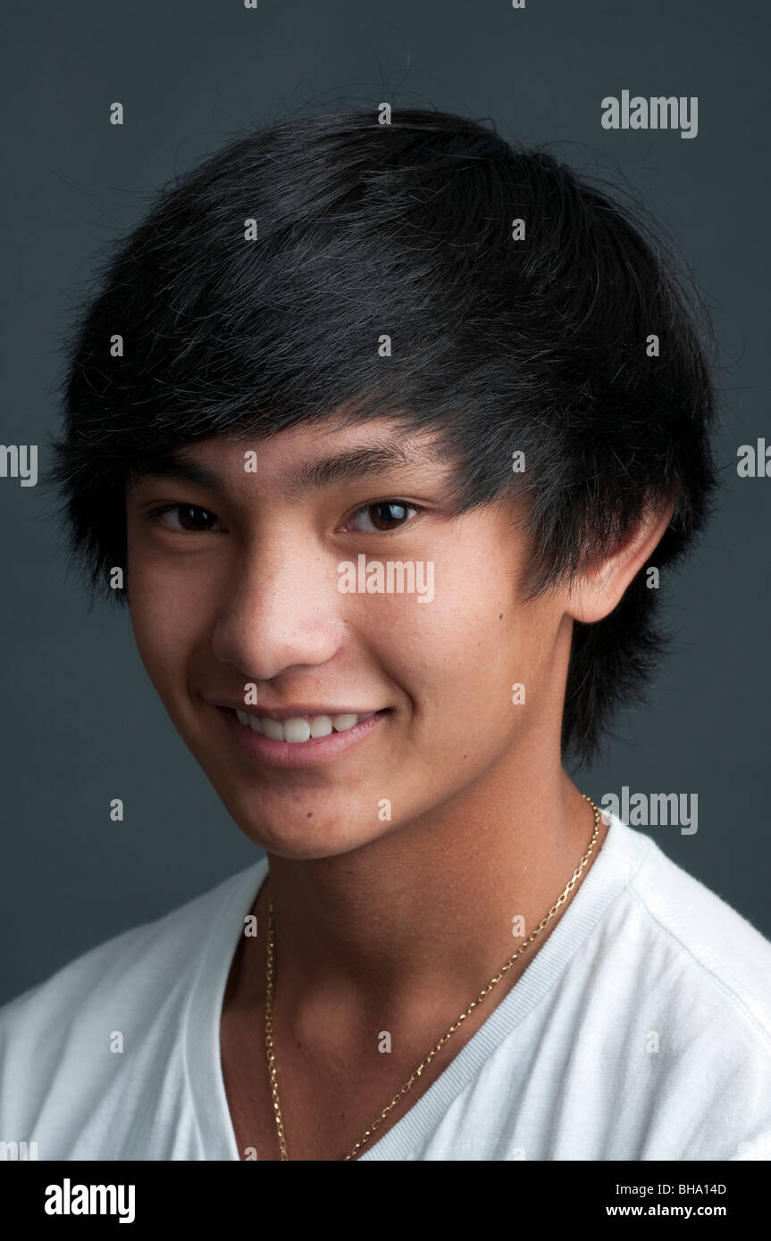 Handsome young boy, son of Hmong Laotian refugee family Stock Photo - Alamy