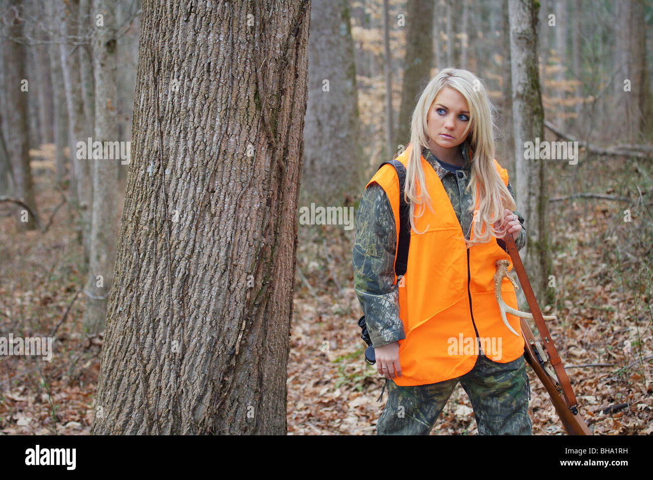 YOUNG WOMAN 21 Y.O. FEMALE HUNTER WALKING IN FOREST LOOKING FOR AND ...