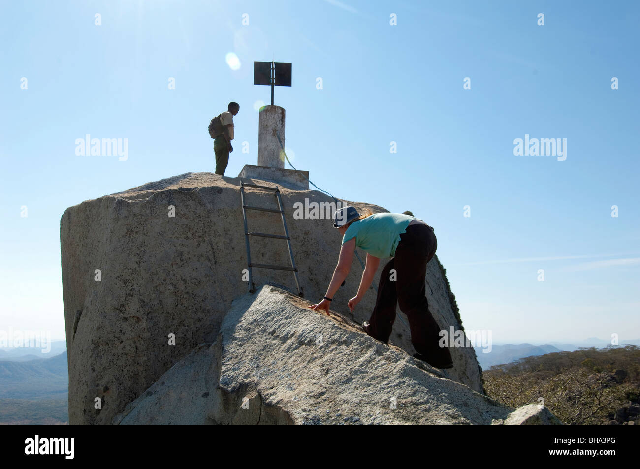 Tourists enjoy hiking through the rough terrain of the Umfurudzi Safari ...