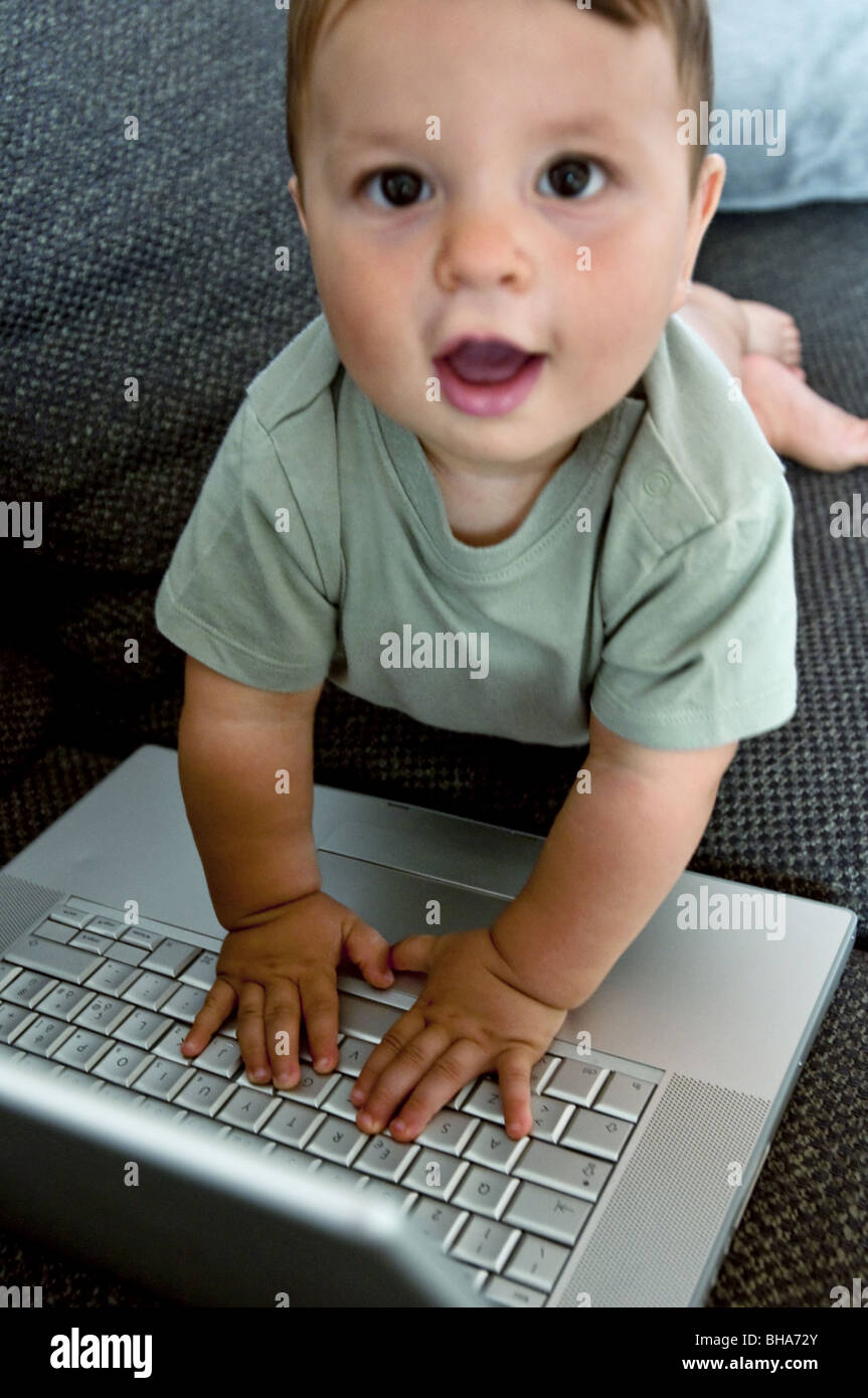 Baby at laptop computer Stock Photo - Alamy