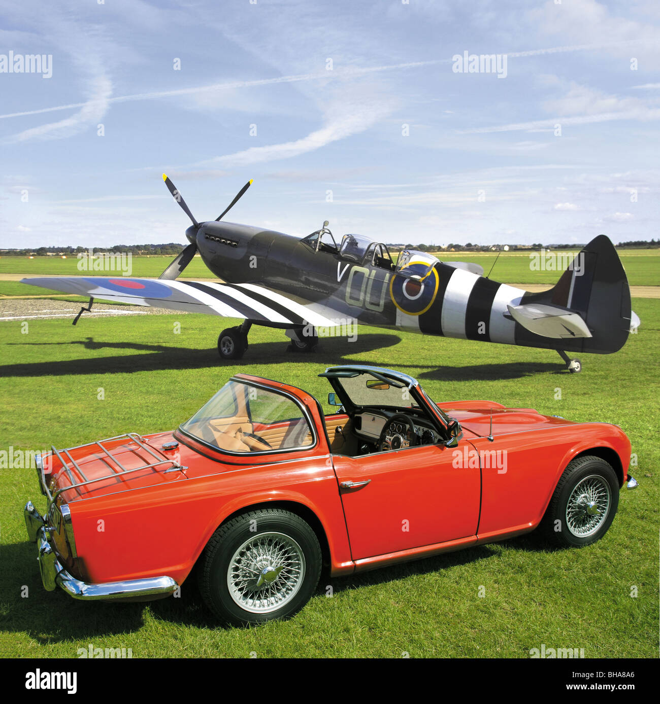 Triumph TR4 with Surrey top. Spitfire Mk9 2 seater in background Stock Photo - Alamy