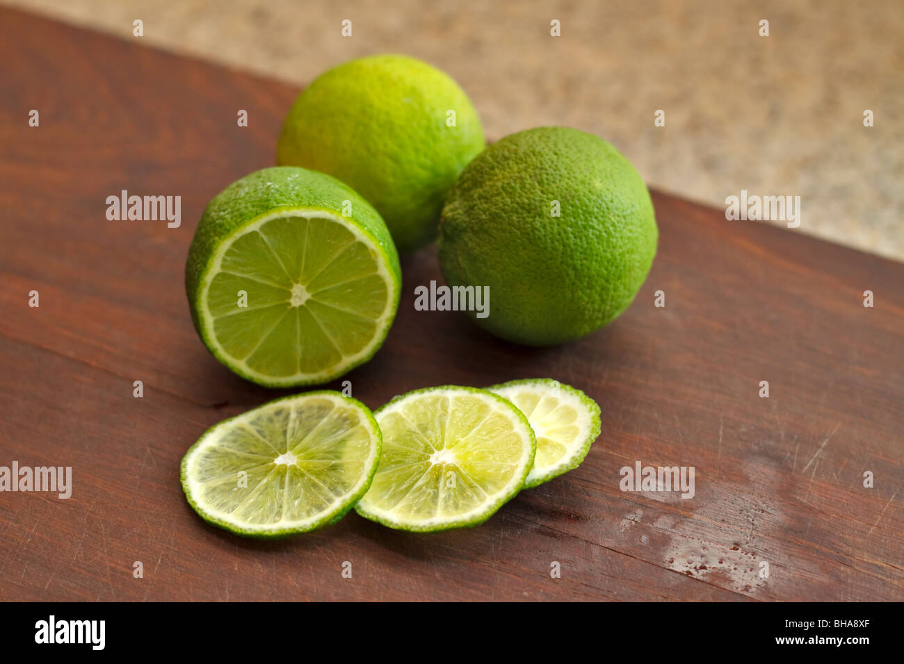 Sliced fresh limes Stock Photo - Alamy