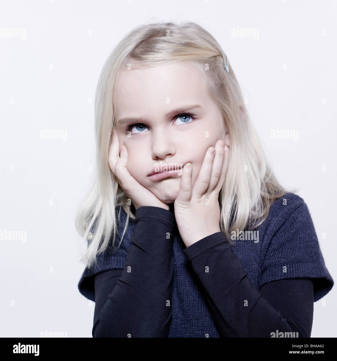 studio portrait of a caucasian cute sulk litle girl Stock Photo - Alamy