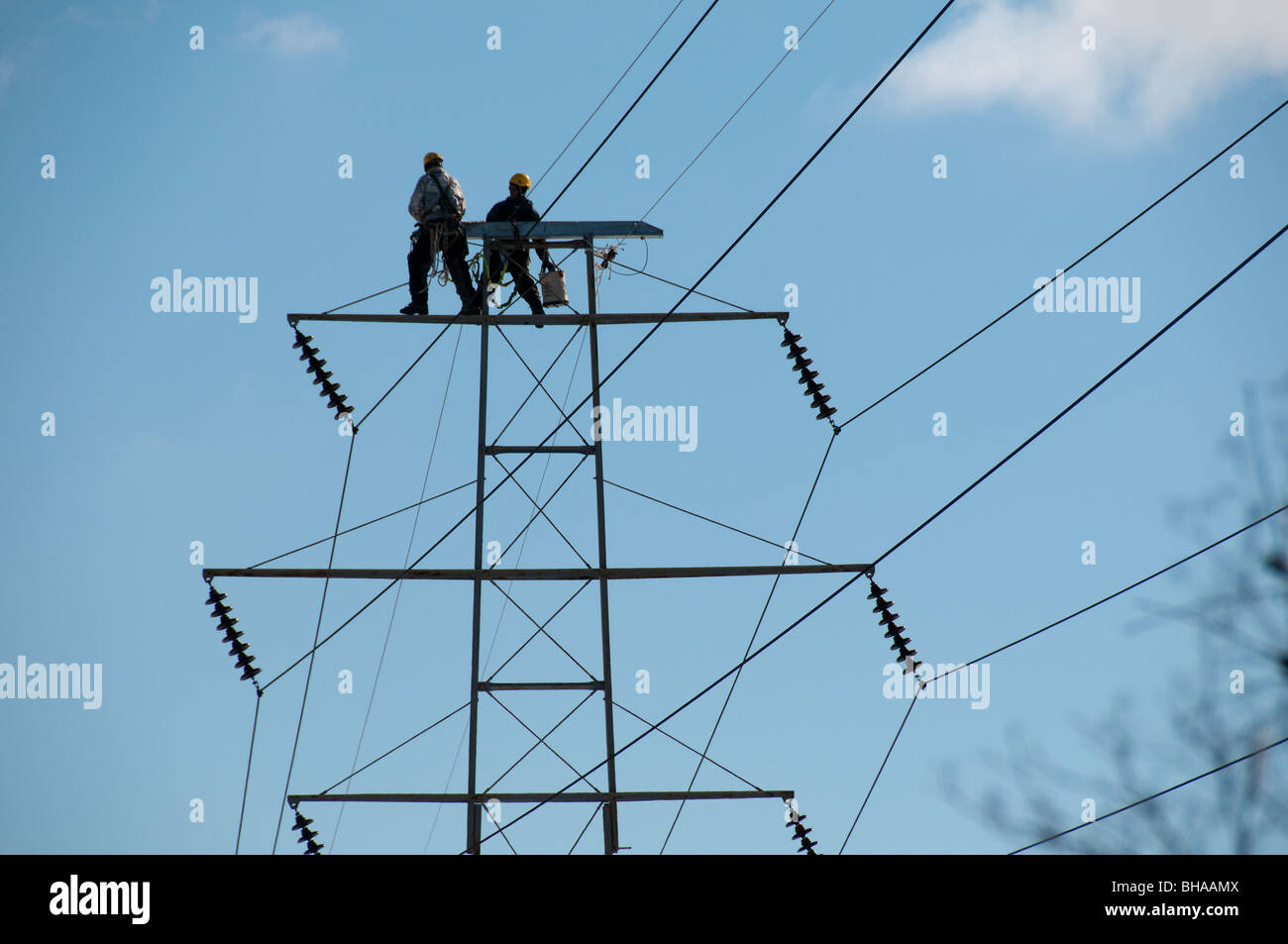 Men working on power lines Stock Photo - Alamy
