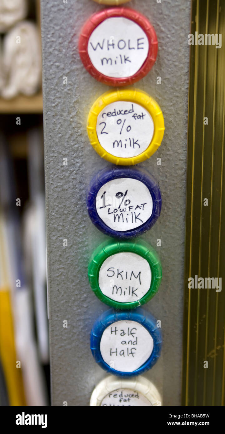Milk caps reflect many choices for the Vermont shopper Stock Photo - Alamy