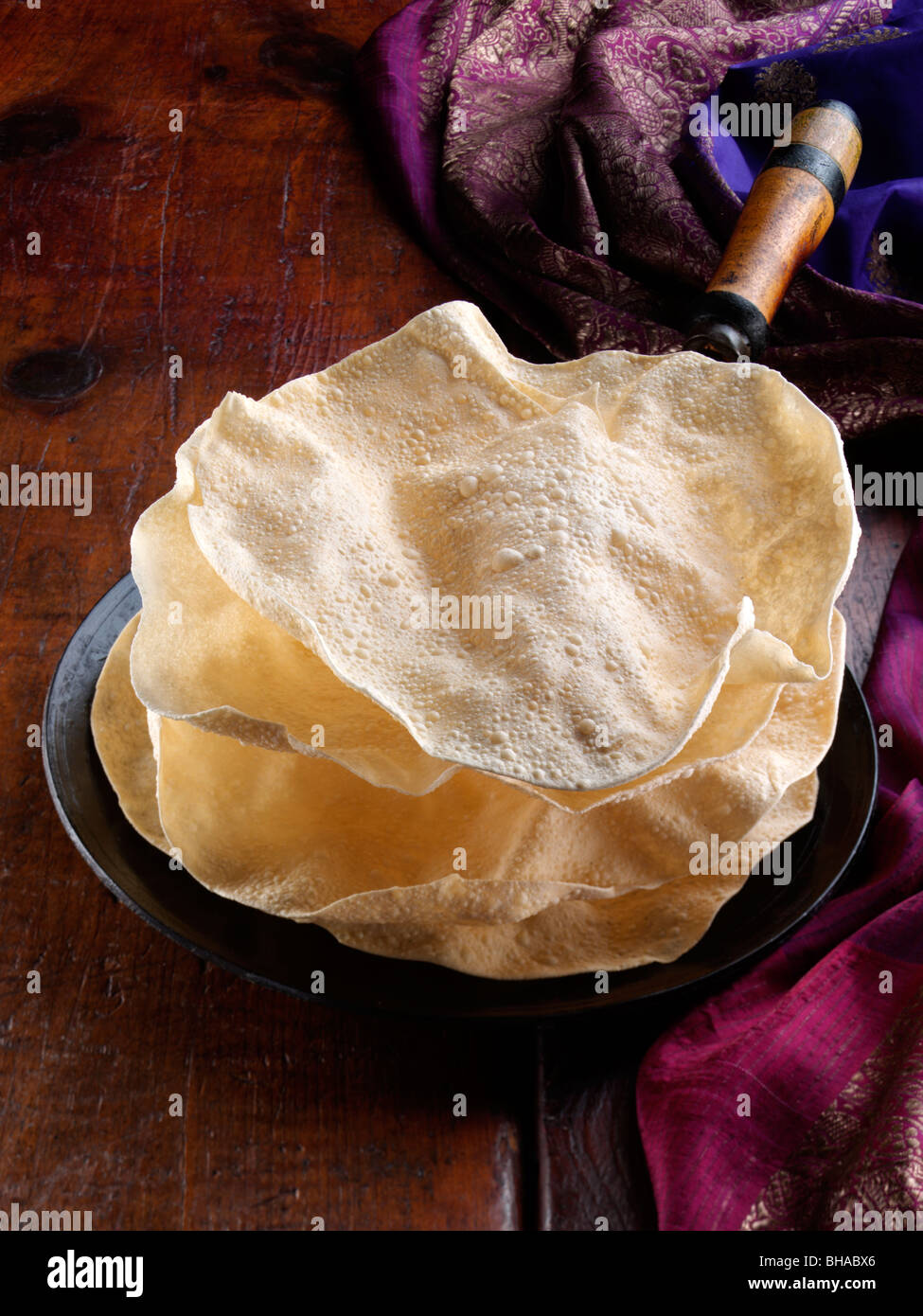 Pile poppadoms in rustic pan hi-res stock photography and images - Alamy