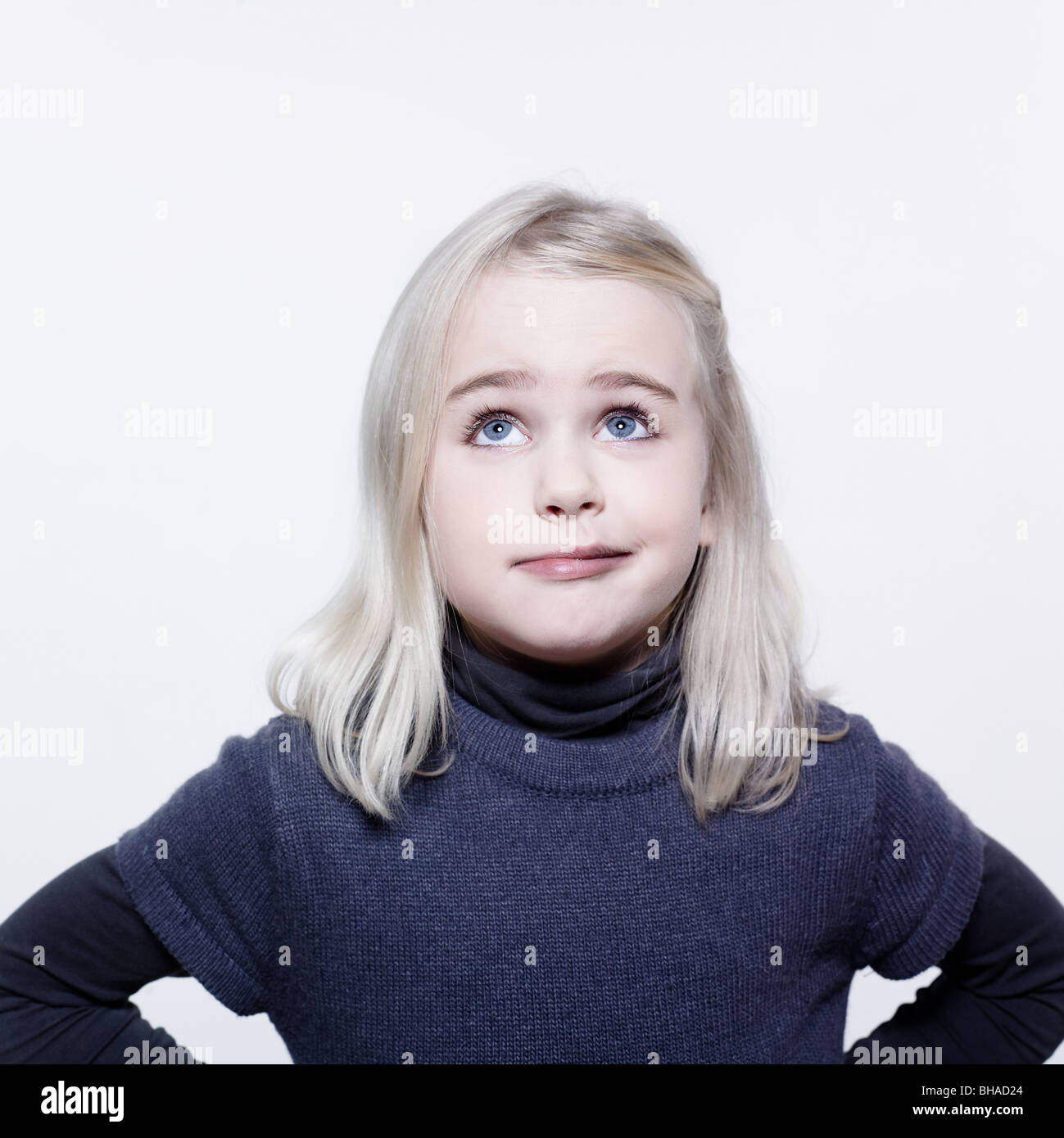 studio portrait of a caucasian cute sulk little girl Stock Photo - Alamy