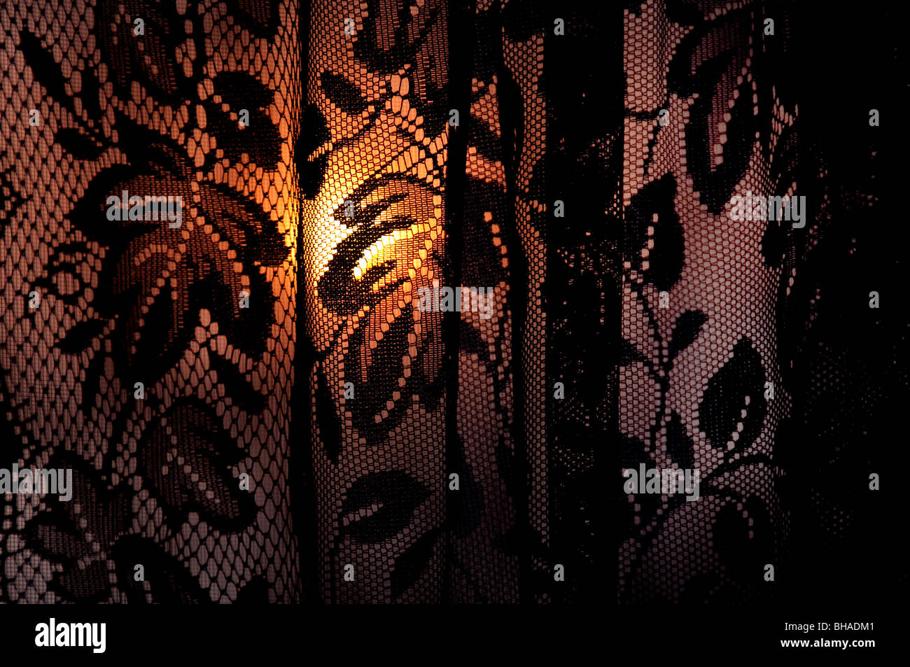 Sunset through lace curtain Stock Photo - Alamy