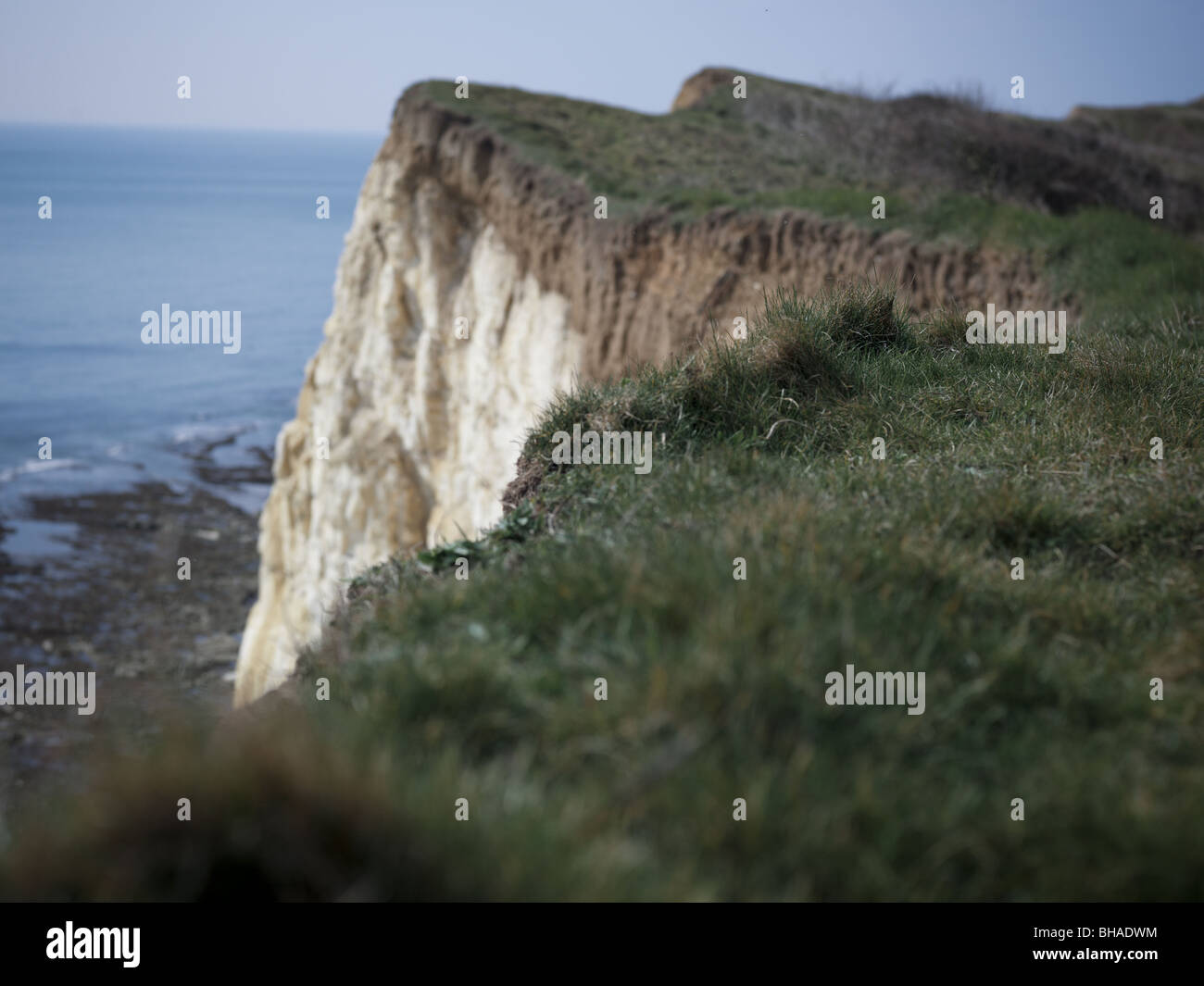 cliff edge, overlooking sea with soil erosion Stock Photo - Alamy