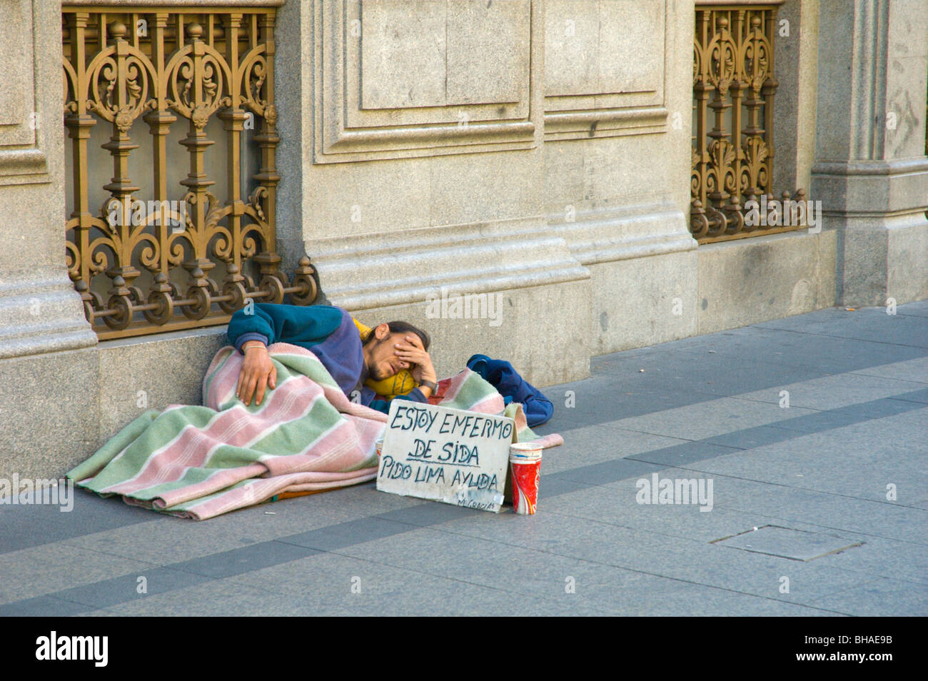 Homeless man at Puerta del Sol square central Madrid Spain Europe Stock ...