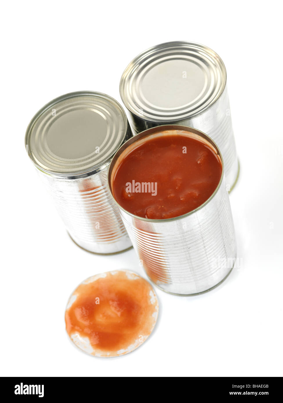 Cans of tinned tomatoes isolated against a white background Stock Photo ...