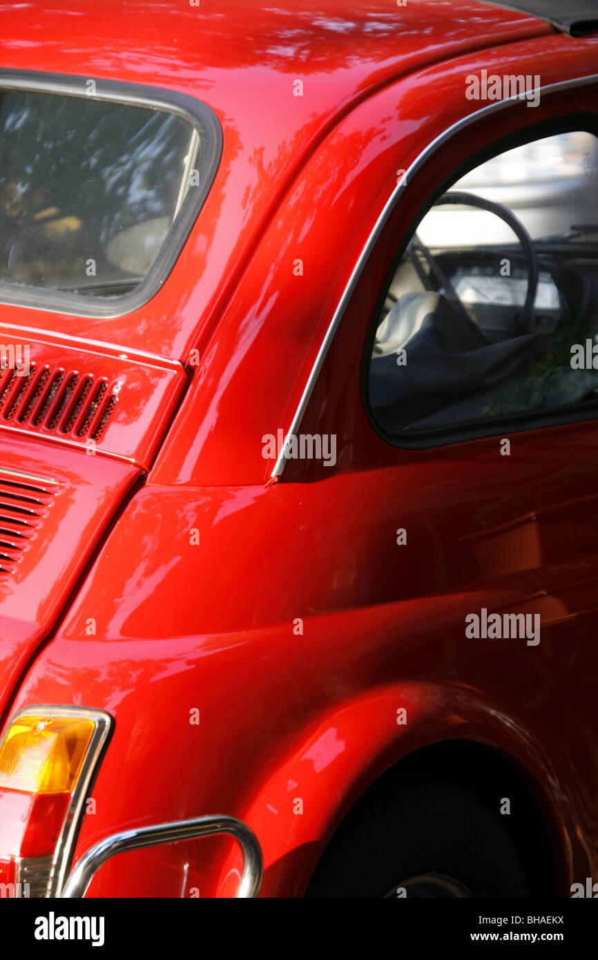old bright red fiat 500 in street, rome italy Stock Photo - Alamy