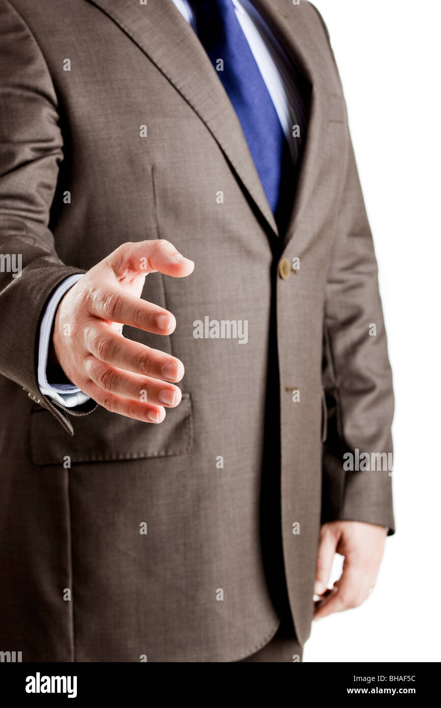Successful business man giving a handshake Stock Photo - Alamy