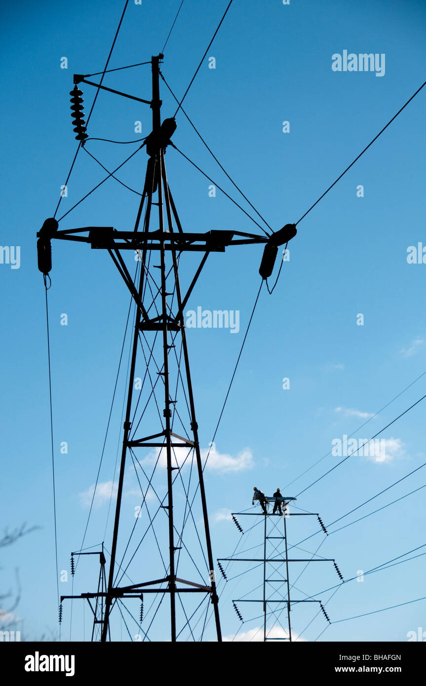 Men working on power lines Stock Photo - Alamy