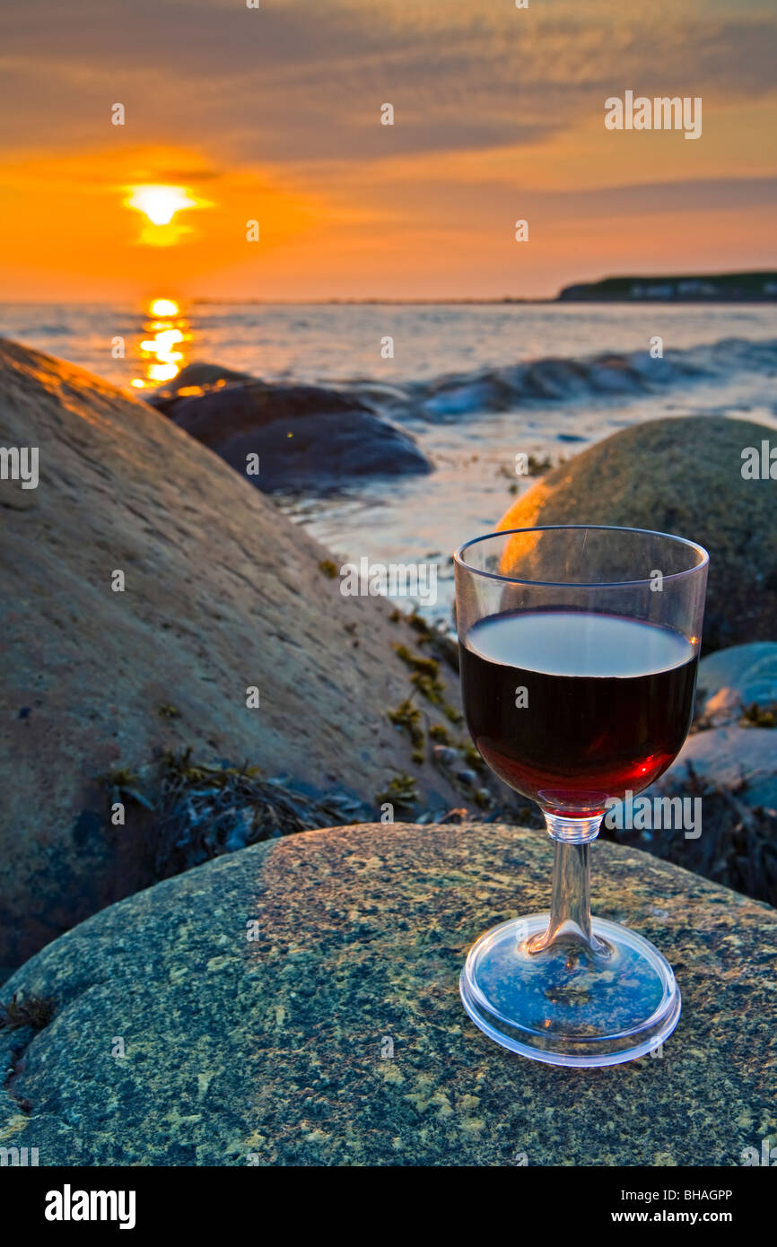The rocky shoreline of Green Point at sunset, Gros Morne National Park ...