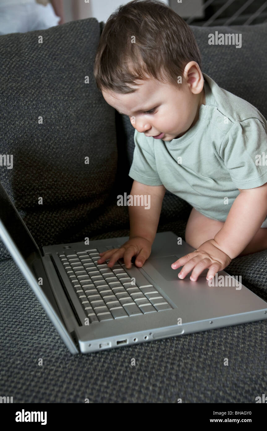 Baby at laptop computer Stock Photo - Alamy