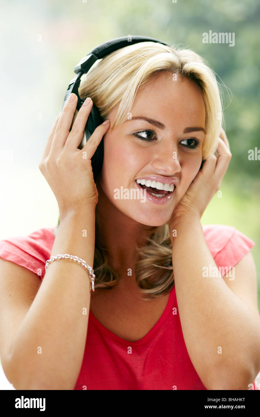 Girl wearing headphones Stock Photo - Alamy