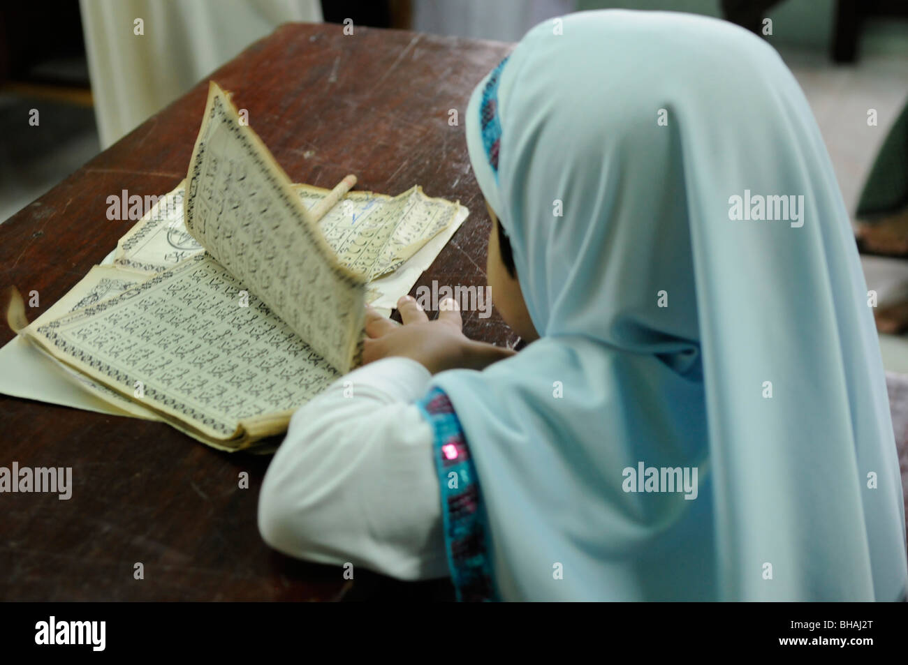 muslim student learning the koran , bangkok , thailand Stock Photo - Alamy