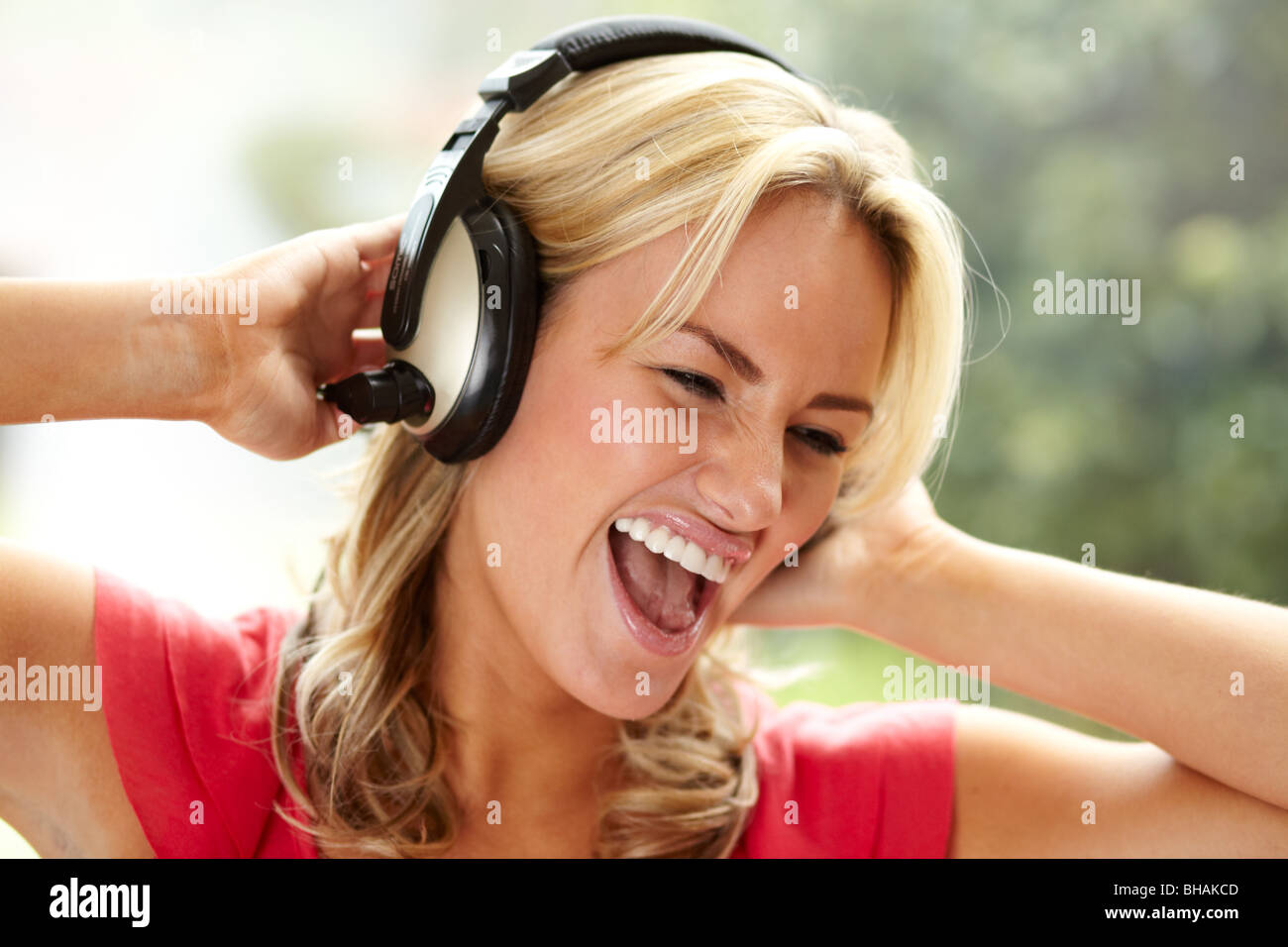 Girl wearing headphones Stock Photo - Alamy