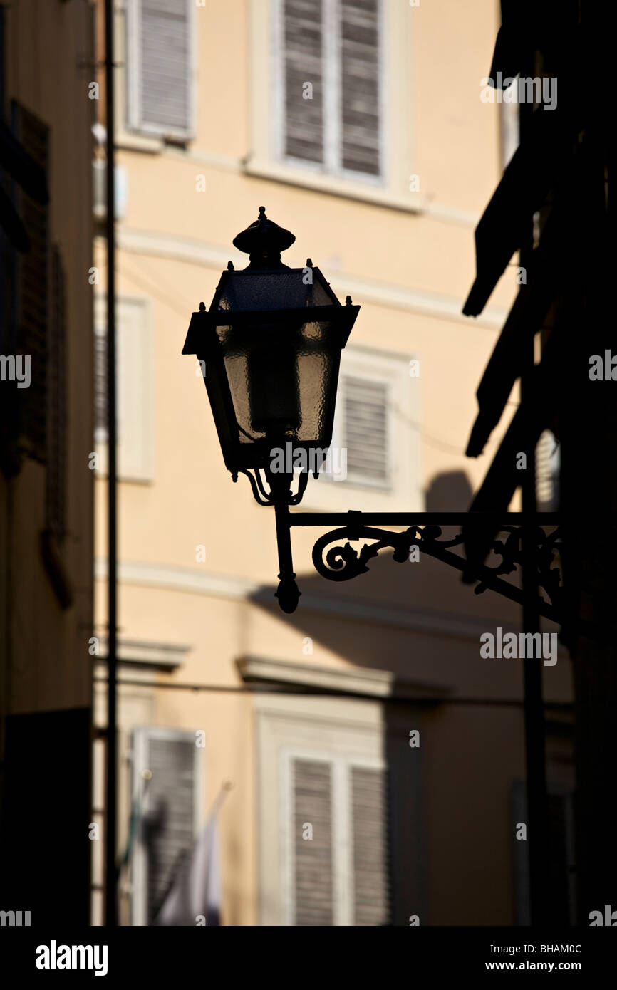Silhouette of streetlight in a typical Italian street, Florence, Italy ...