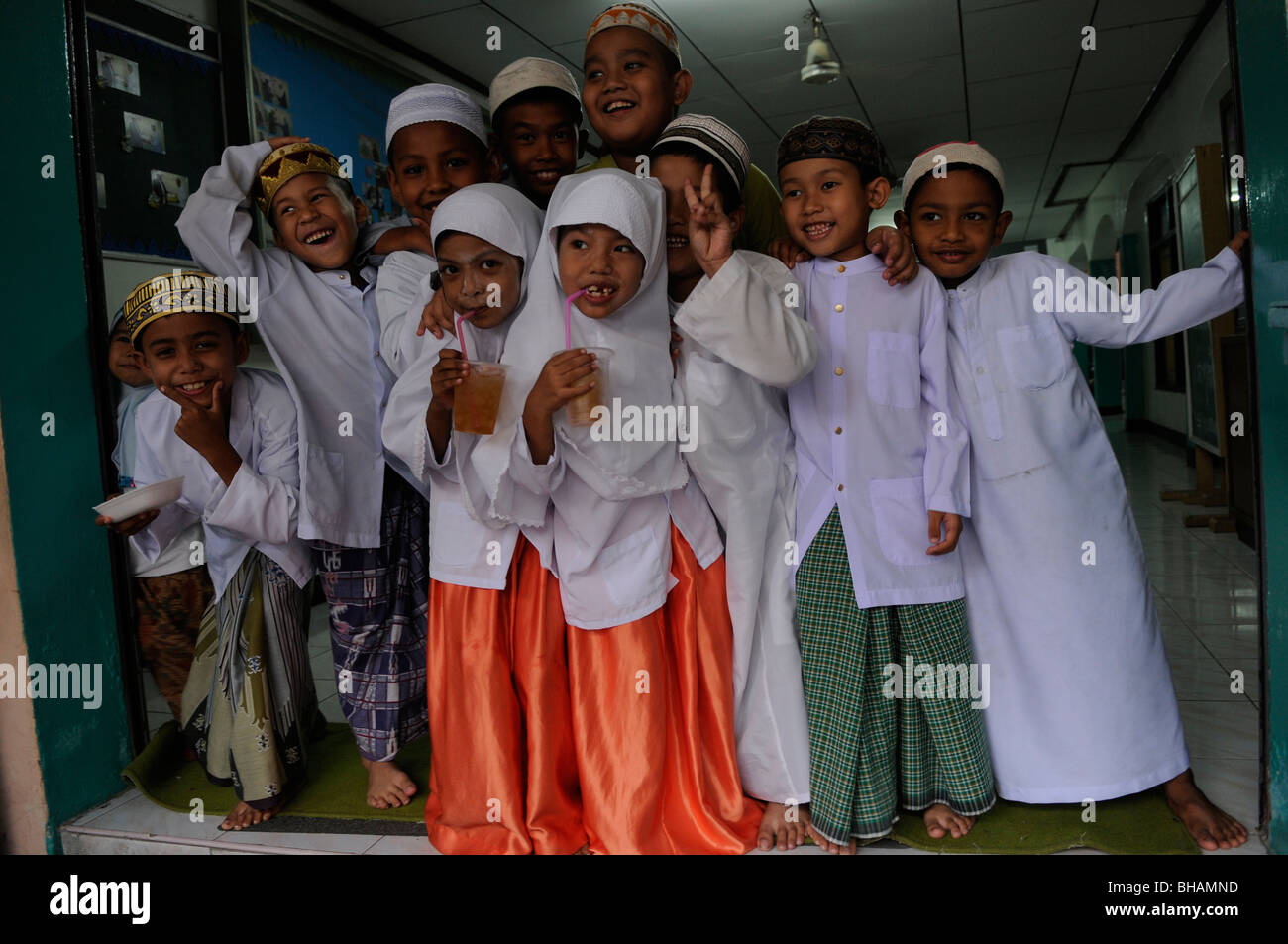 Muslim students in traditional dress hi-res stock photography and ...