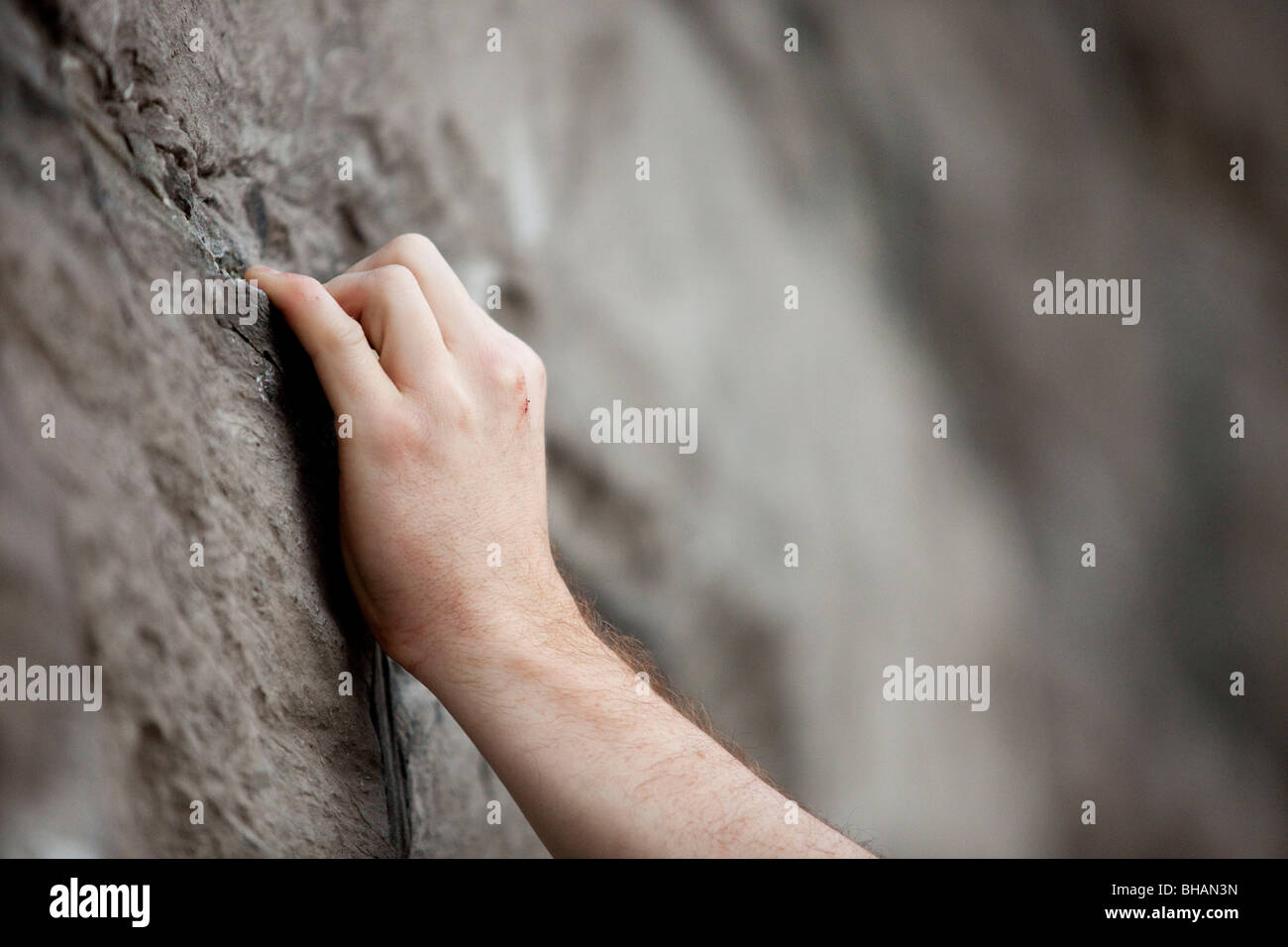 Hand of a man while he climbs Stock Photo - Alamy