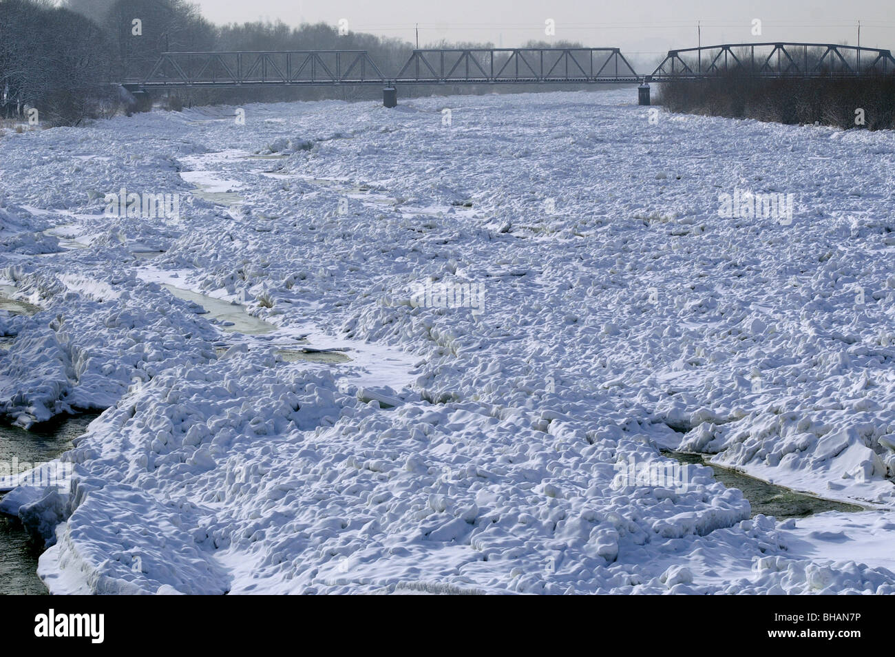 Dangerous ice jam on the river. Bridge in danger. Poland 2010 Stock ...
