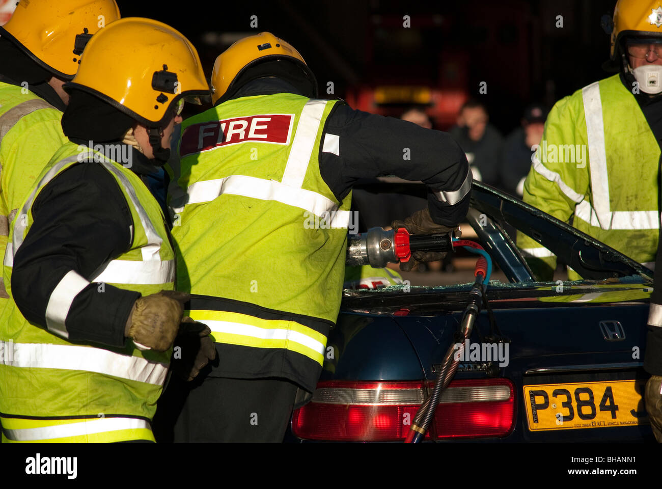 Firemen practicing RTC extrication procedures Stock Photo - Alamy