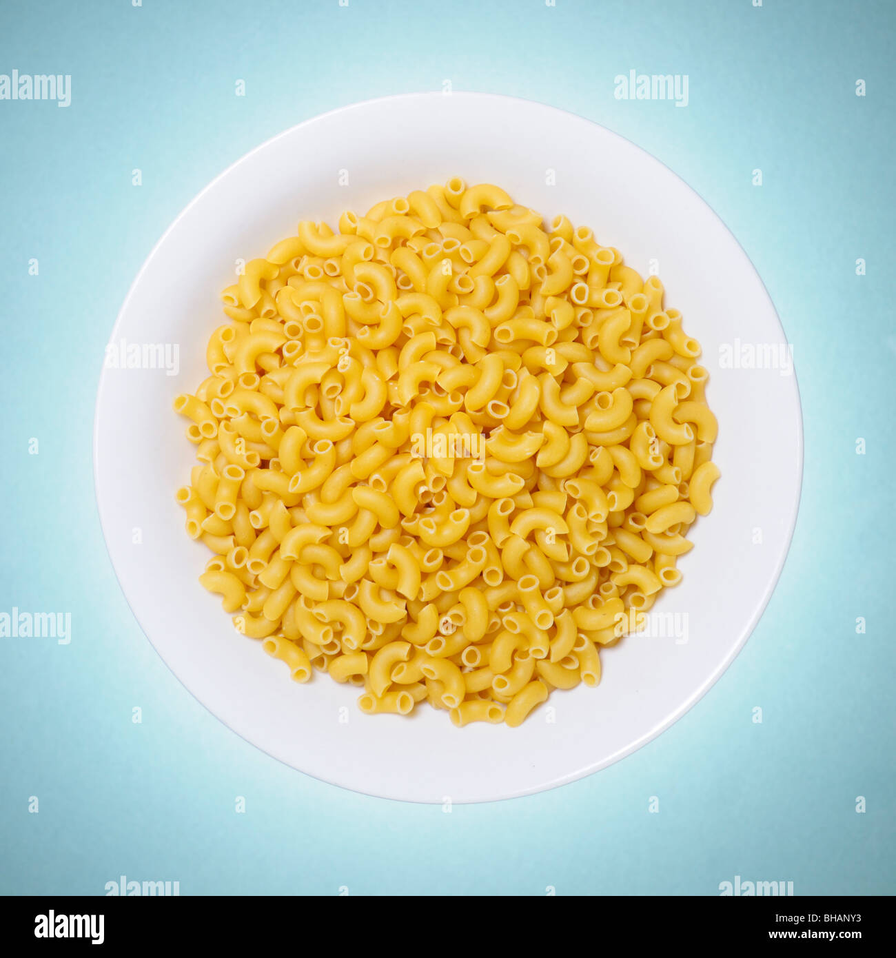 A bowl of uncooked pasta Stock Photo - Alamy