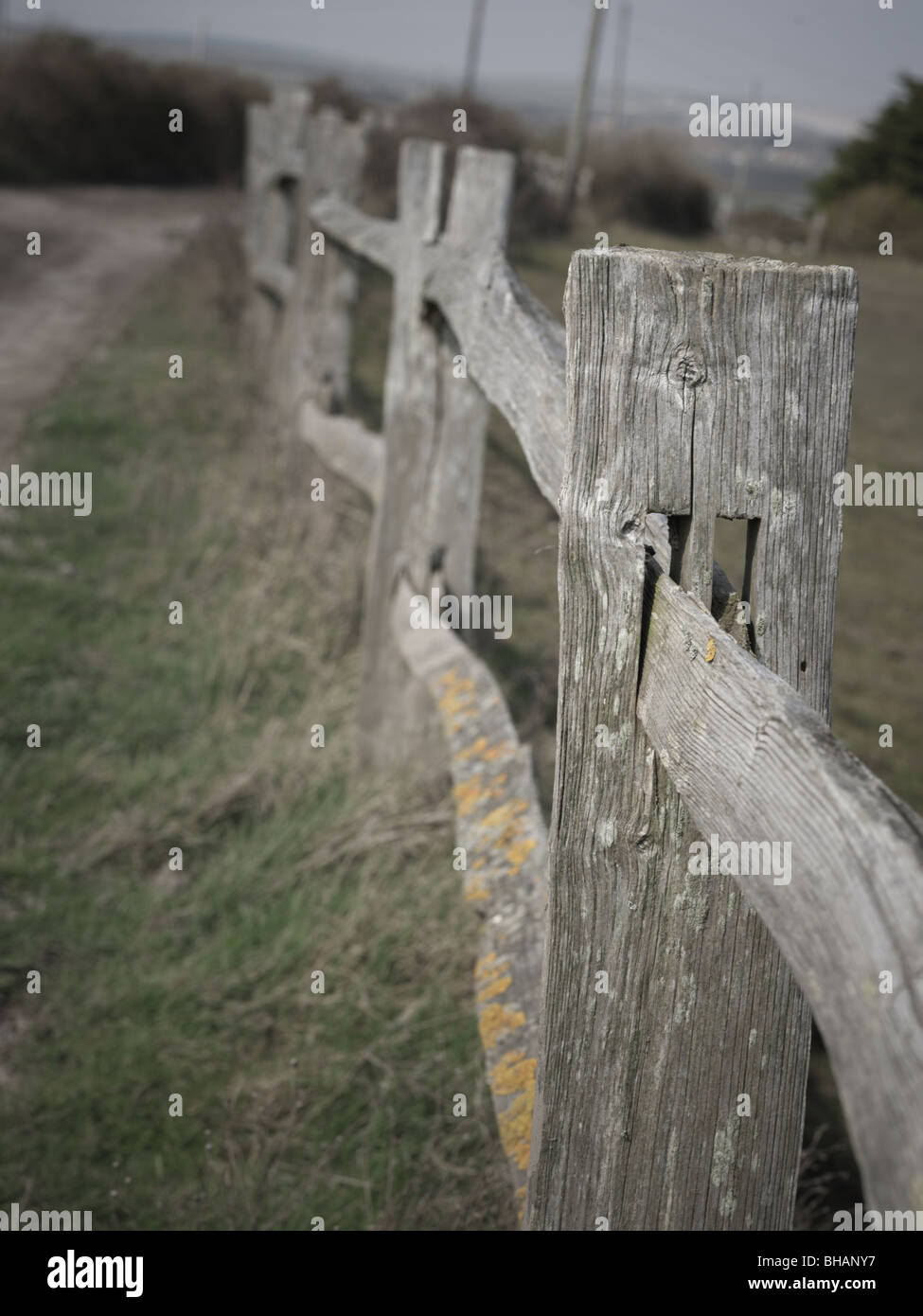 wooden fence running along side track Stock Photo - Alamy