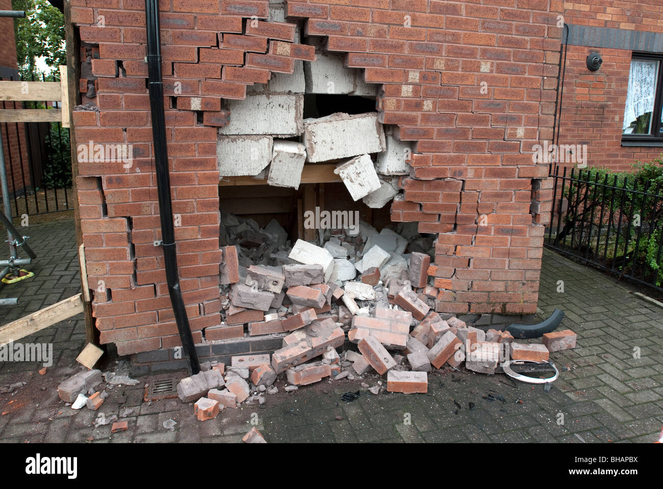 Collapsed gable wall of house following car crashing into it Stock ...