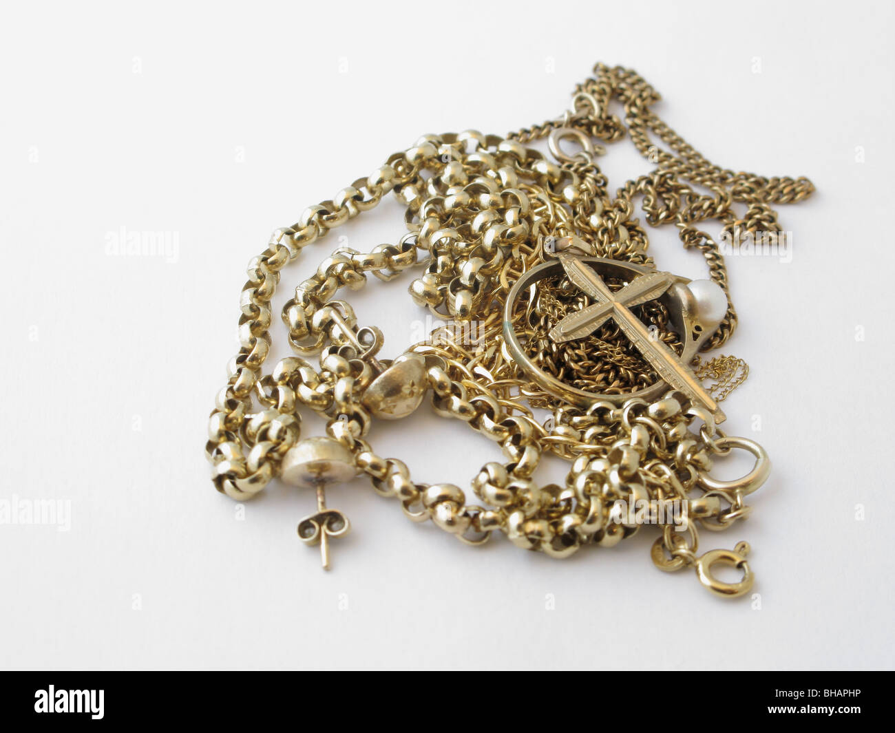Cash for gold Small pile of mixed gold jewellery to be sold for scrap ...