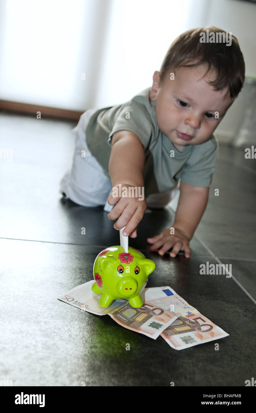 Baby economics hi-res stock photography and images - Alamy