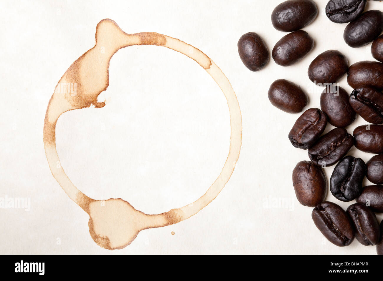 coffee beans on a parchment paper background Stock Photo - Alamy