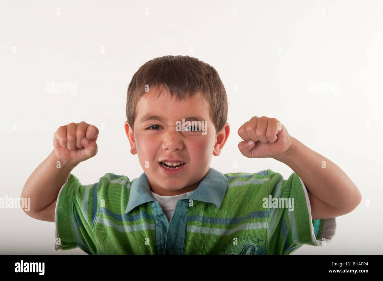 portrait of little Pacific Islander boy (5 years old) against white ...