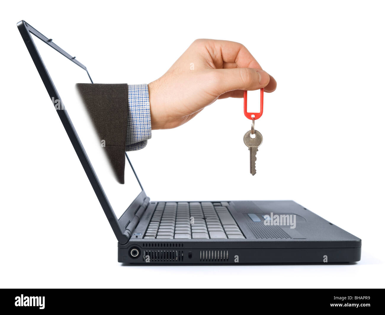 A man's hand with a key comes from the laptop screen. Isolated over ...