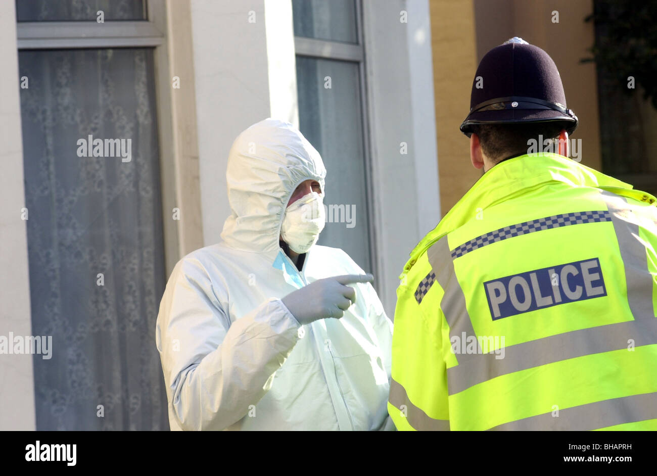 Scene of crime officertalks with a Police constable after a fatal ...