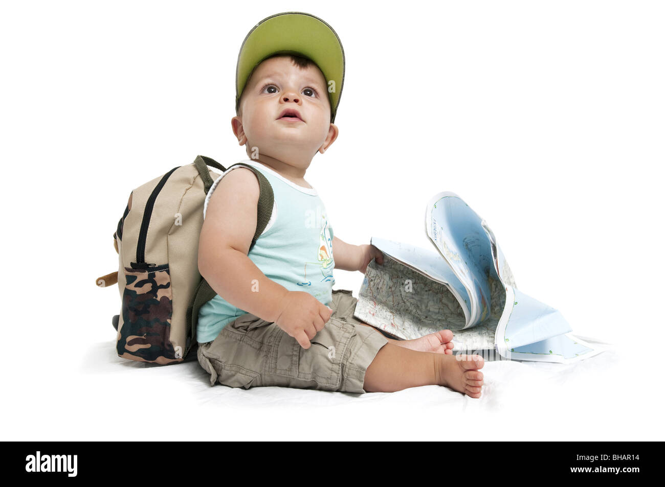Baby boy with backpack and map Stock Photo - Alamy